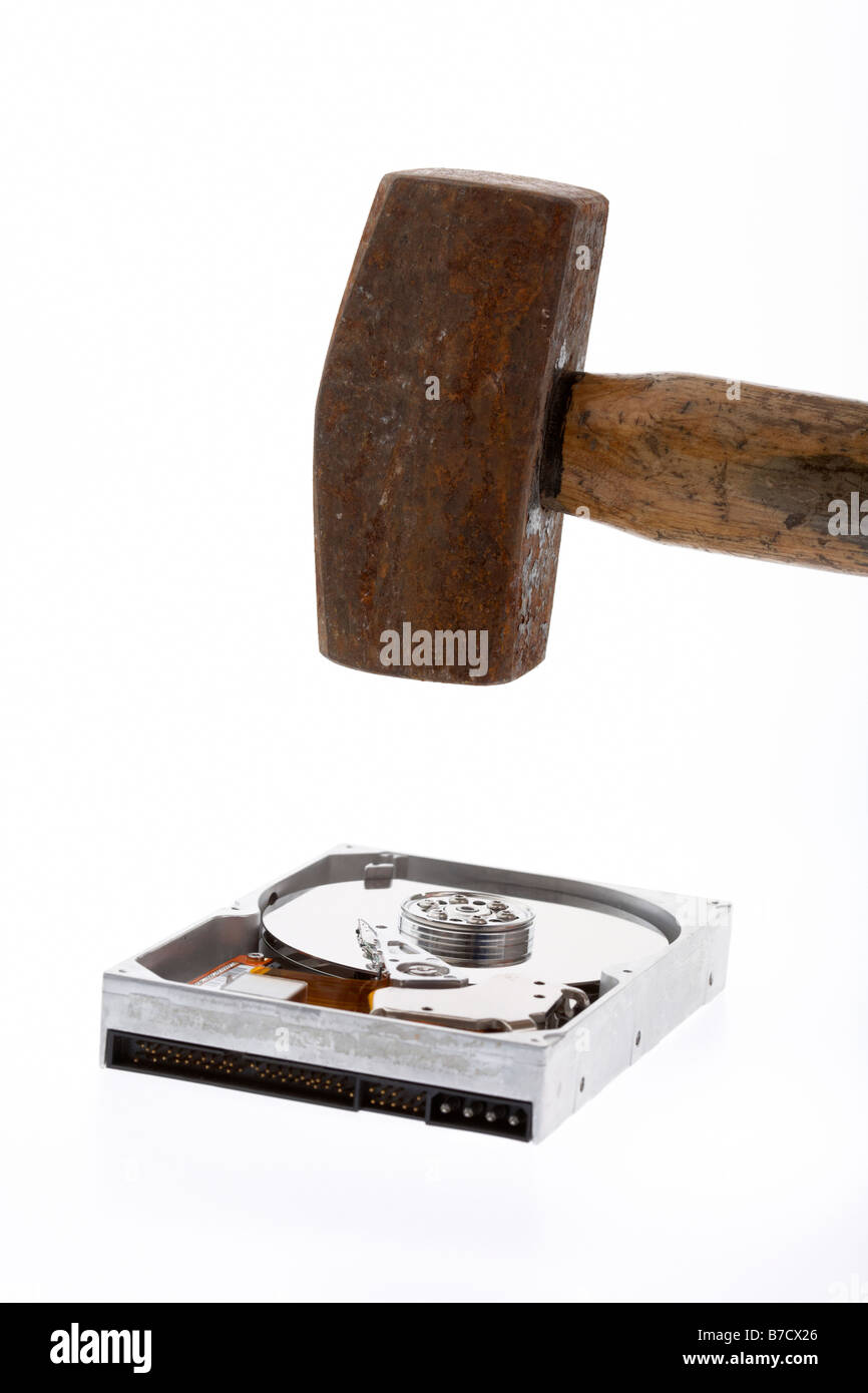 old sledge hammer over a computer hard drive on white background Stock ...