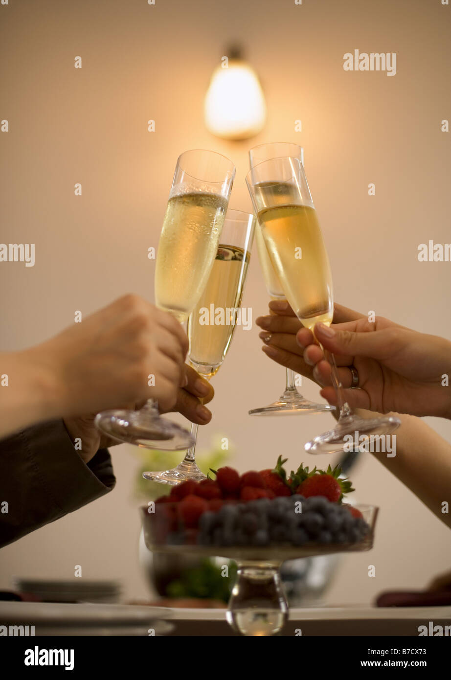 Toasting with champagne Stock Photo - Alamy