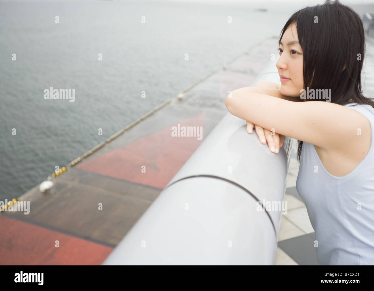 Young woman looking away on ship Stock Photo - Alamy