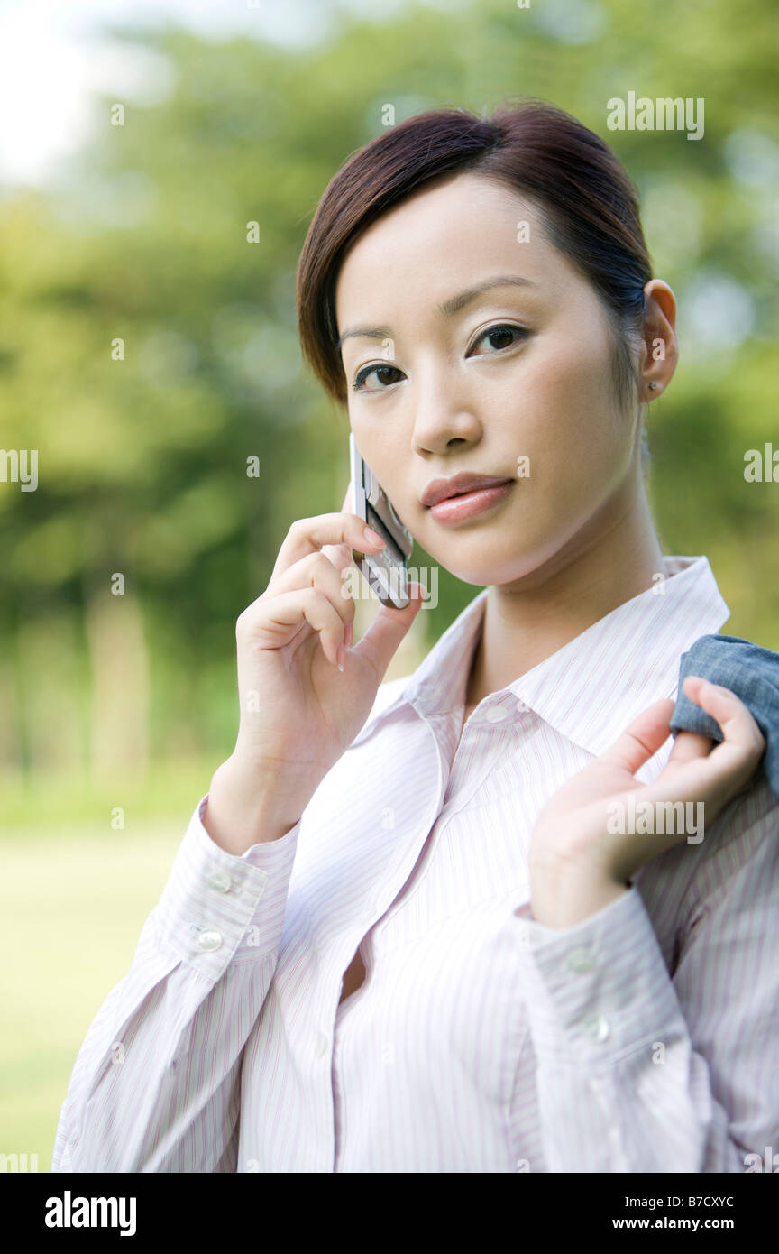 Back view woman phone green hi-res stock photography and images - Alamy