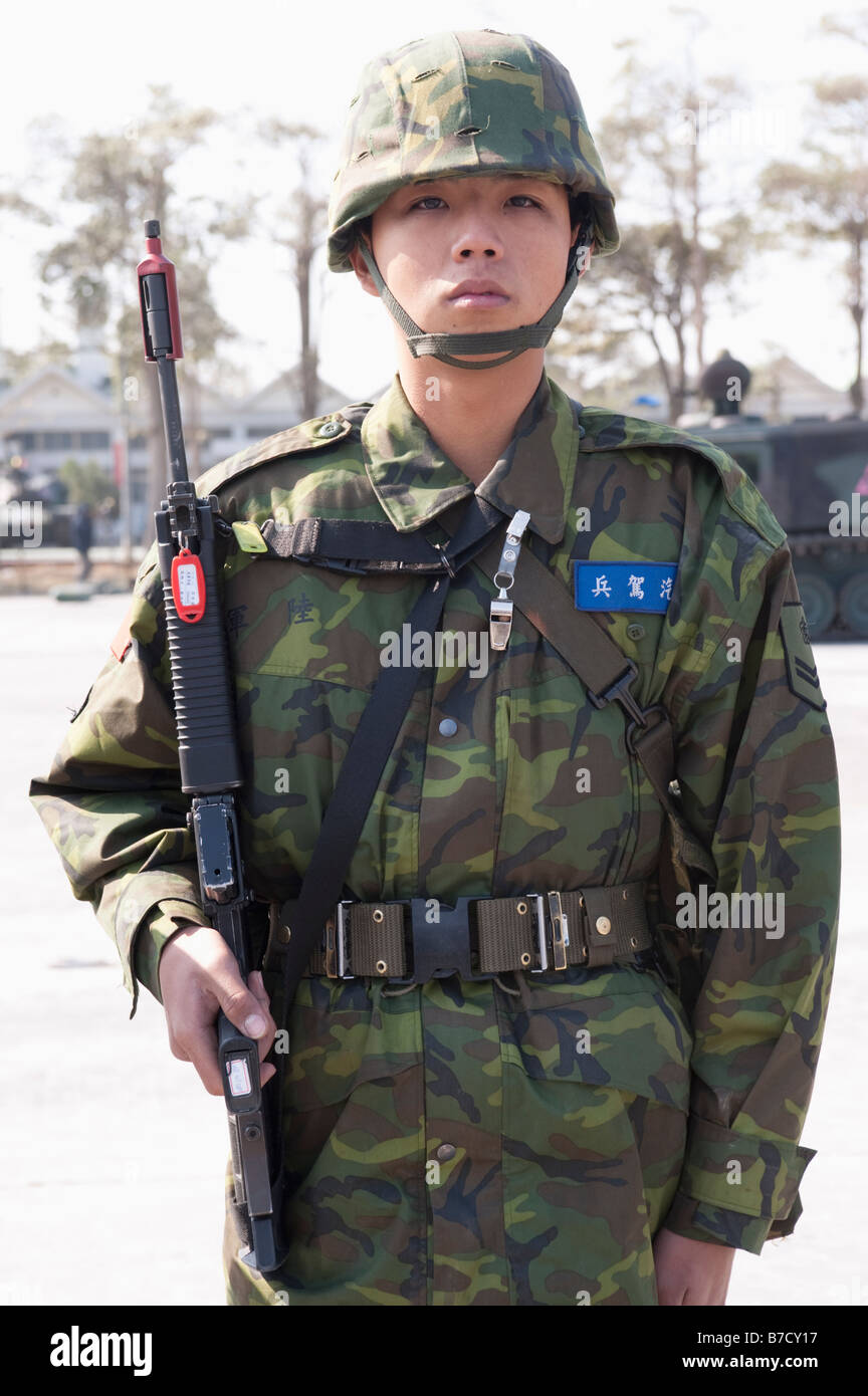 Taiwanese Soldier Holding His Rifle Standing At Attention, 58th ...
