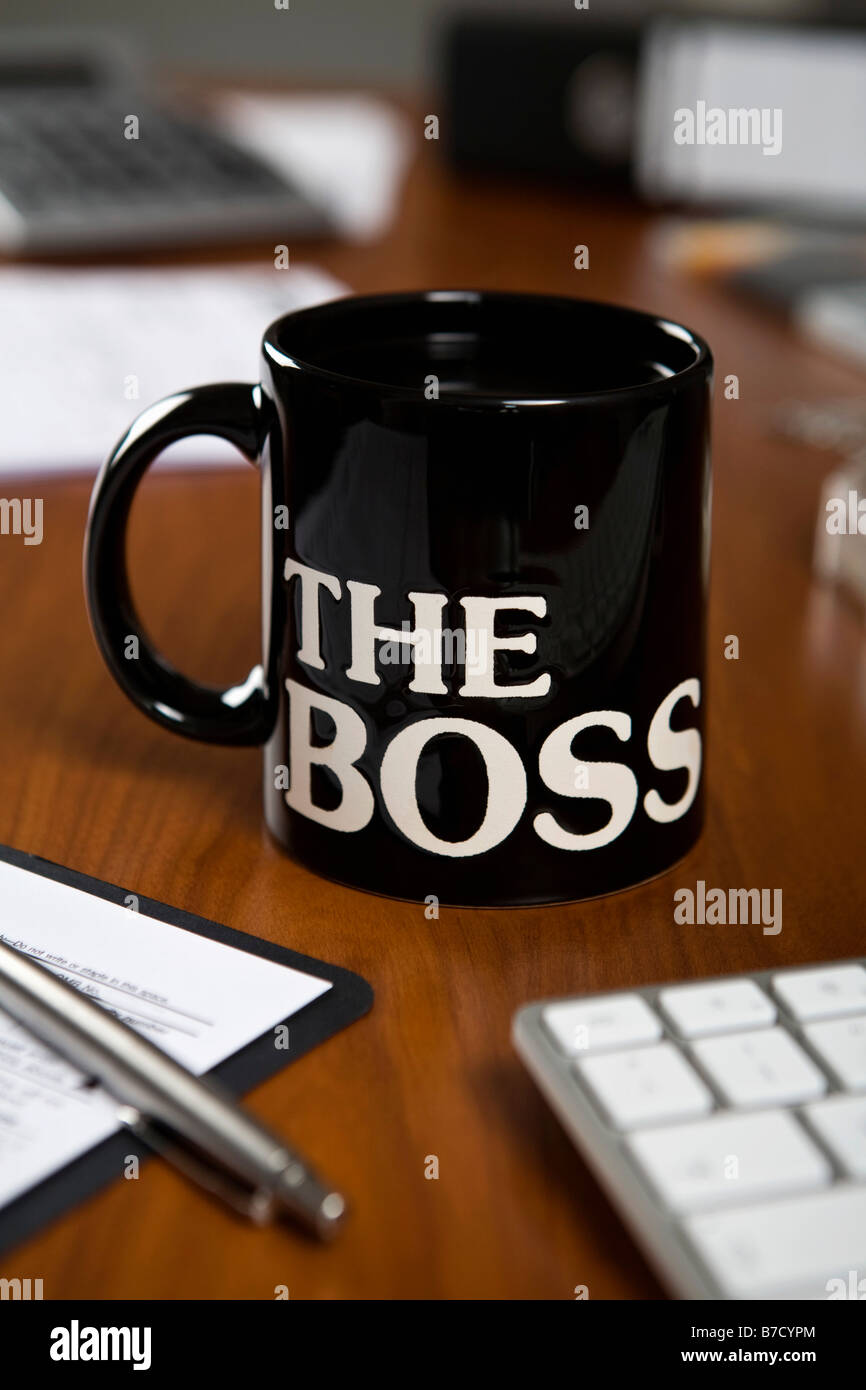 The Boss mug on a desk Stock Photo - Alamy