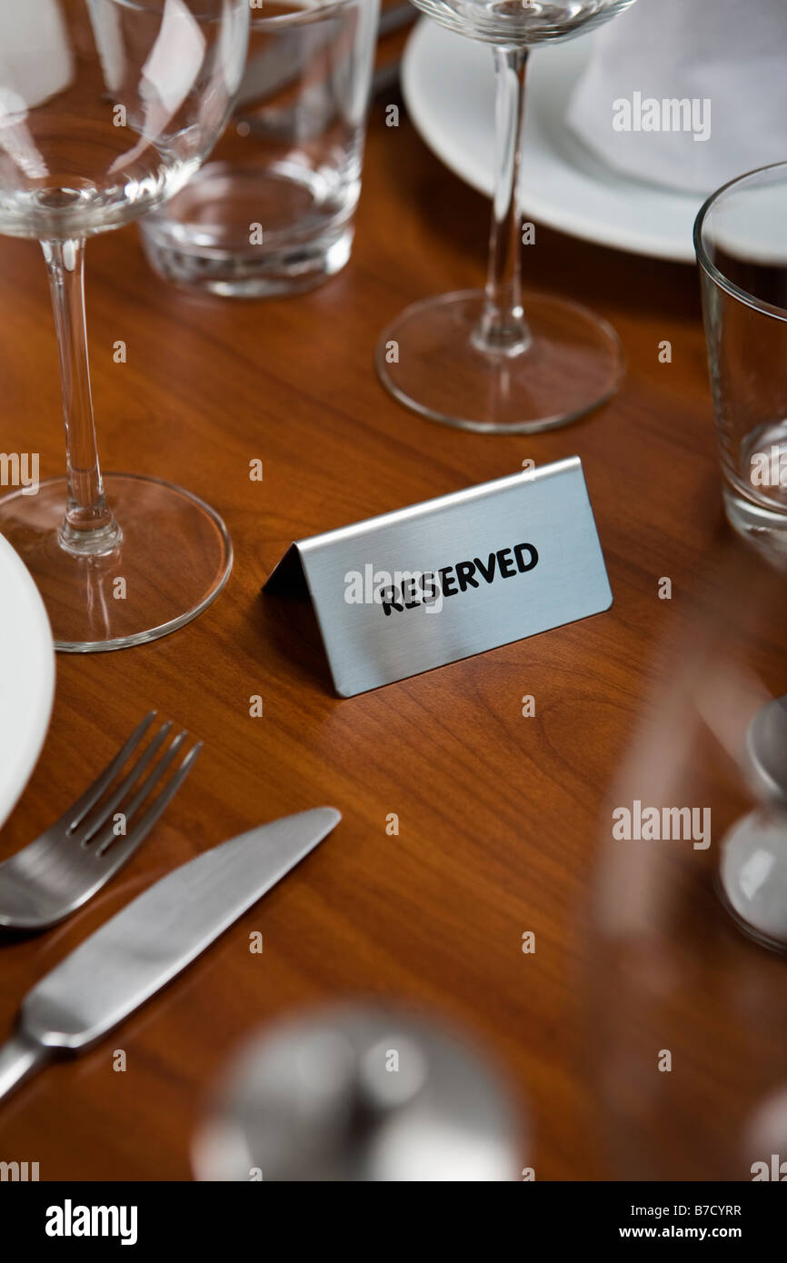 Reserved Sign on a dining table Stock Photo - Alamy