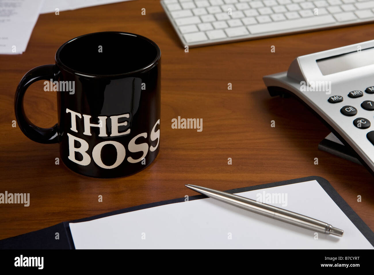 The Boss mug on a desk Stock Photo - Alamy