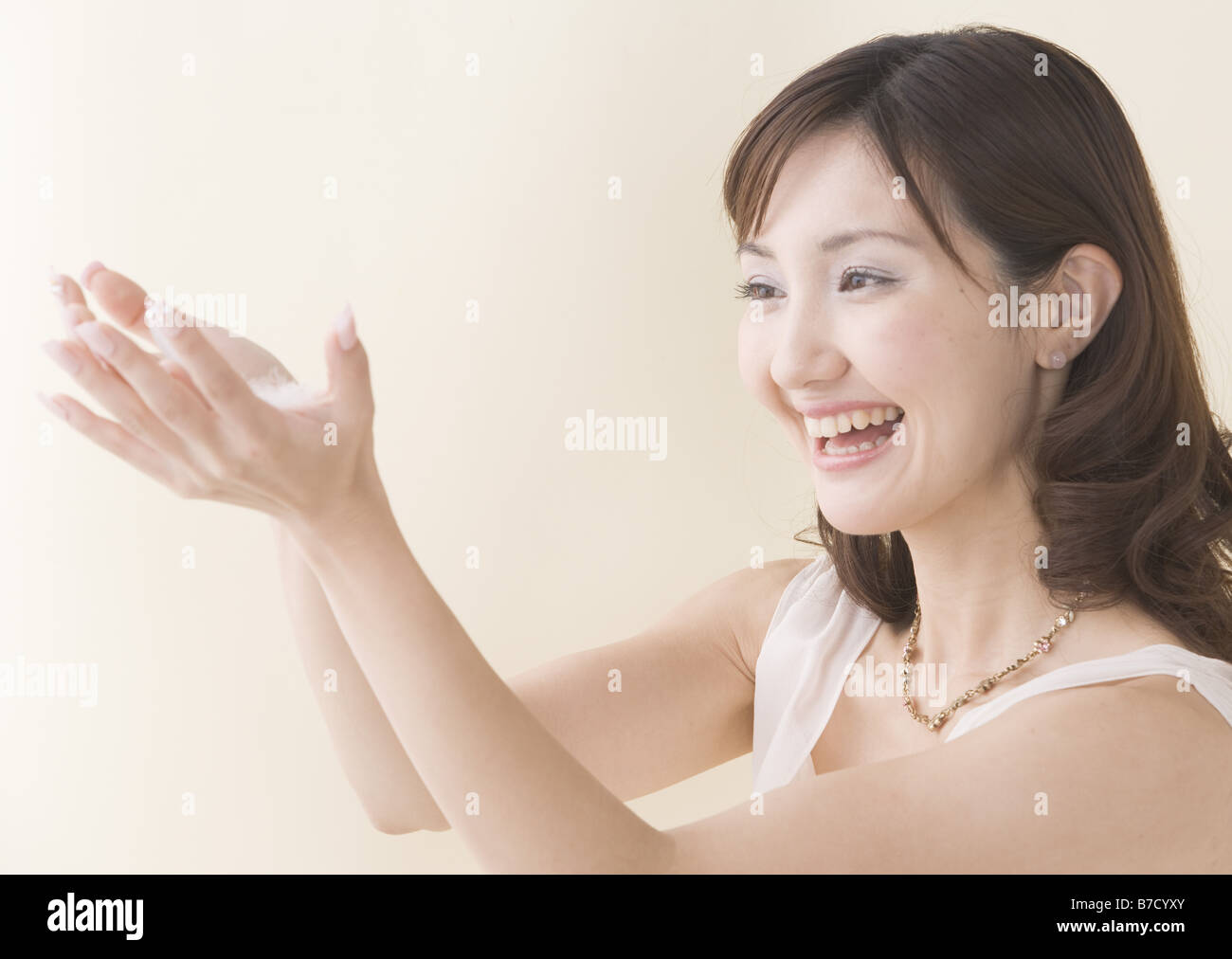 Feather earrings hi-res stock photography and images - Alamy