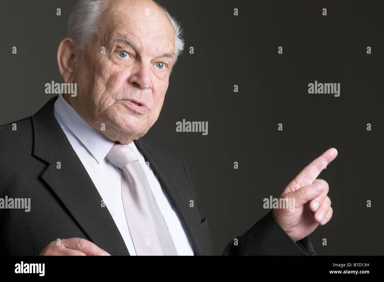 A senior man talking, portrait Stock Photo - Alamy