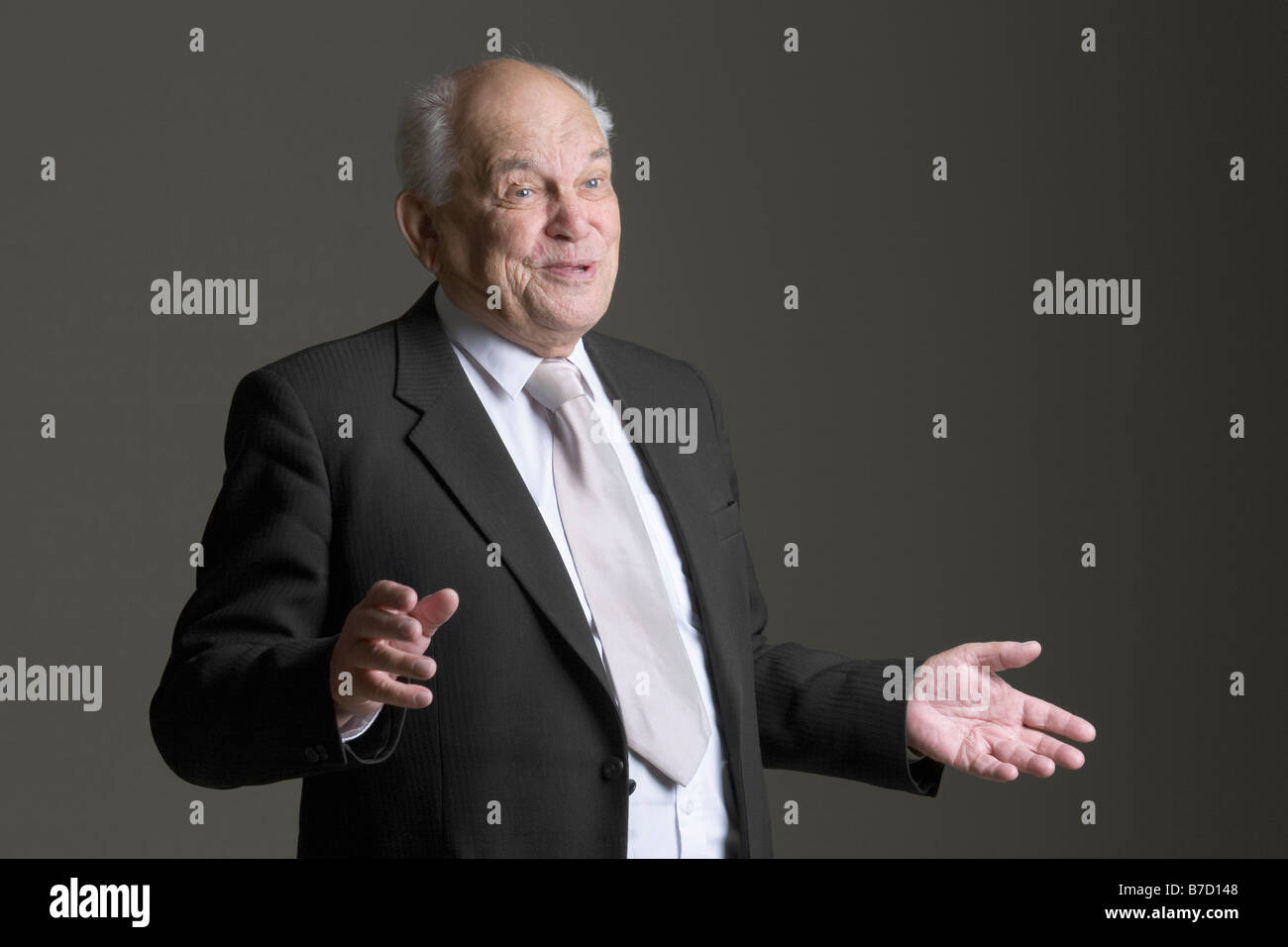 A senior man talking, portrait Stock Photo - Alamy
