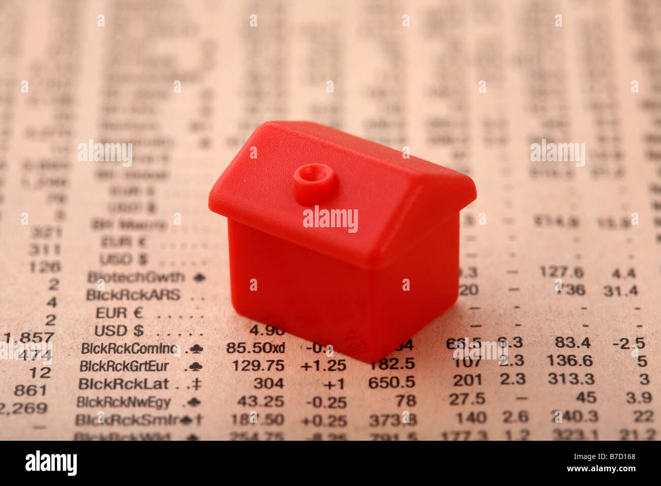 Red toy house sitting hi-res stock photography and images - Alamy