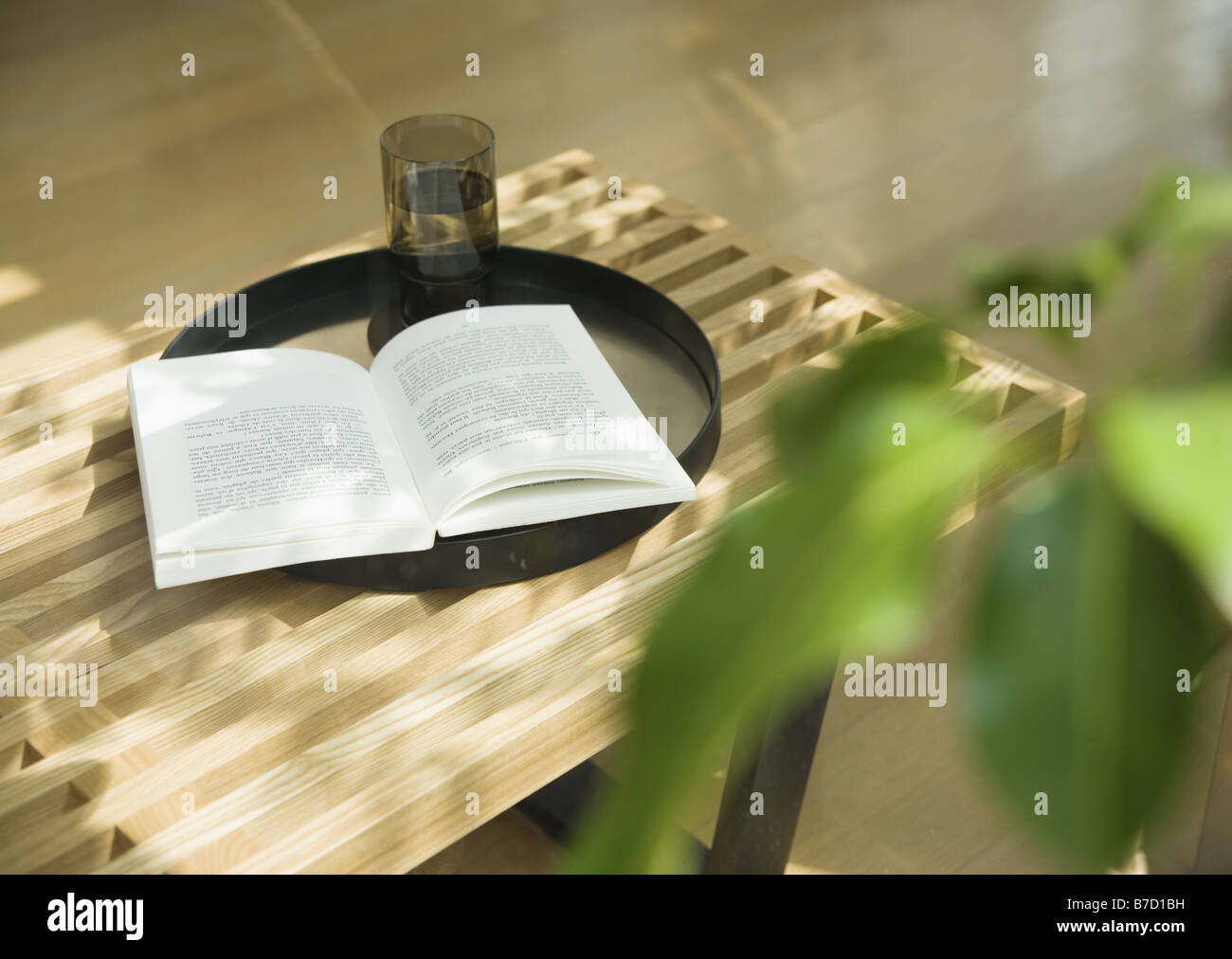 Book on the table Stock Photo - Alamy
