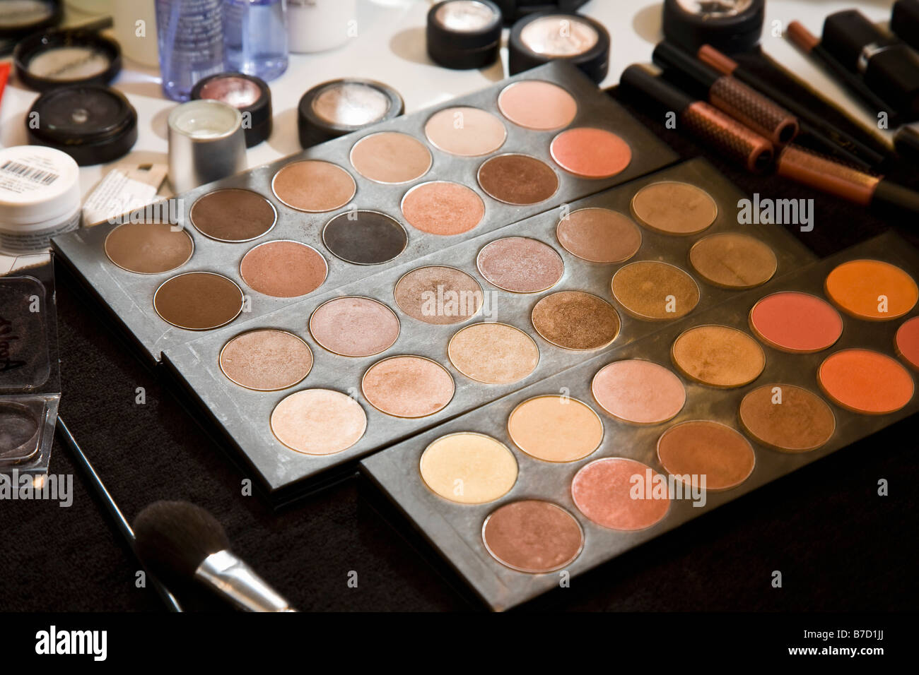 Make up scattered across a counter Stock Photo - Alamy