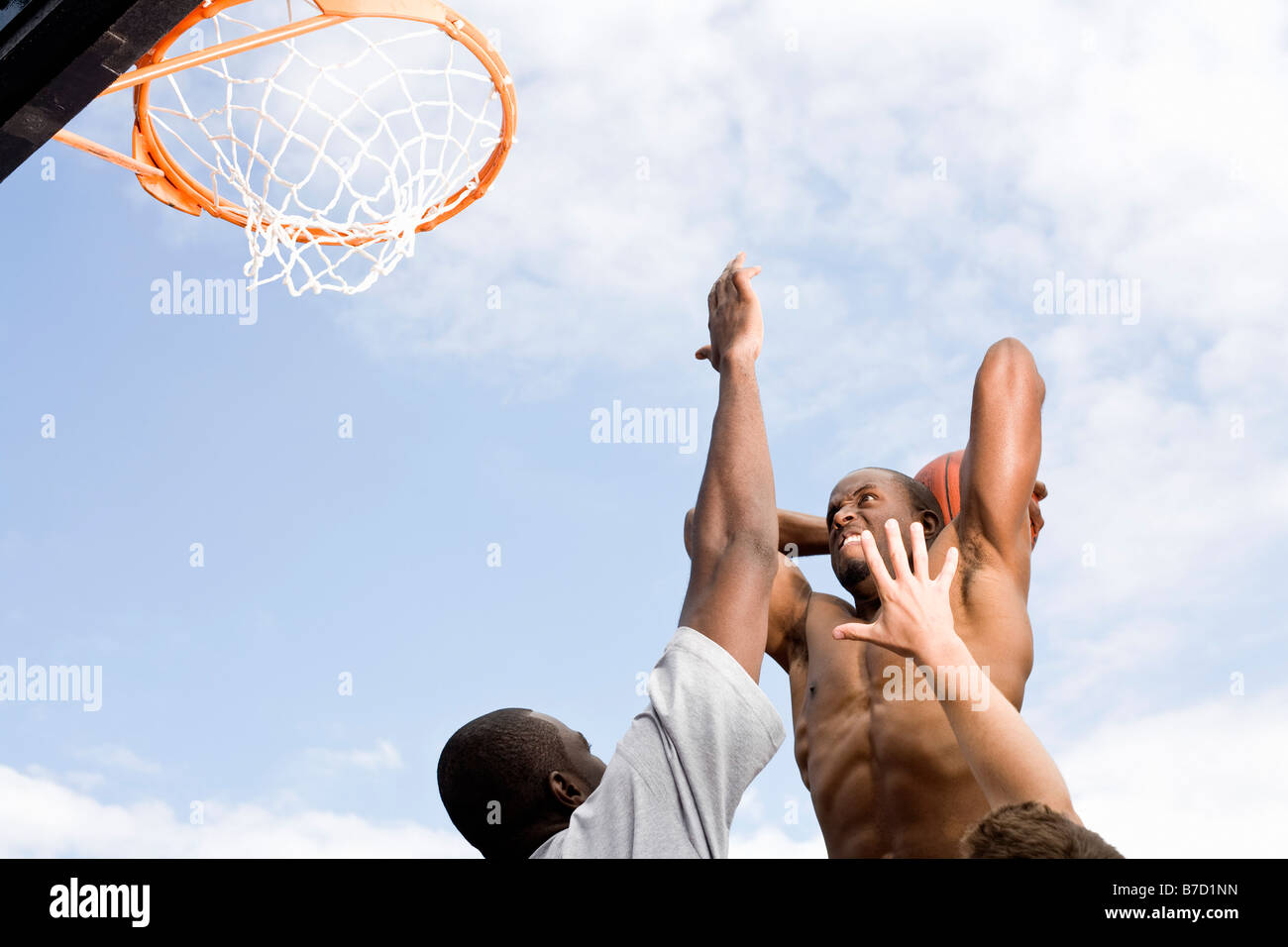 A basketball player preparing to make a slam dunk Stock Photo - Alamy