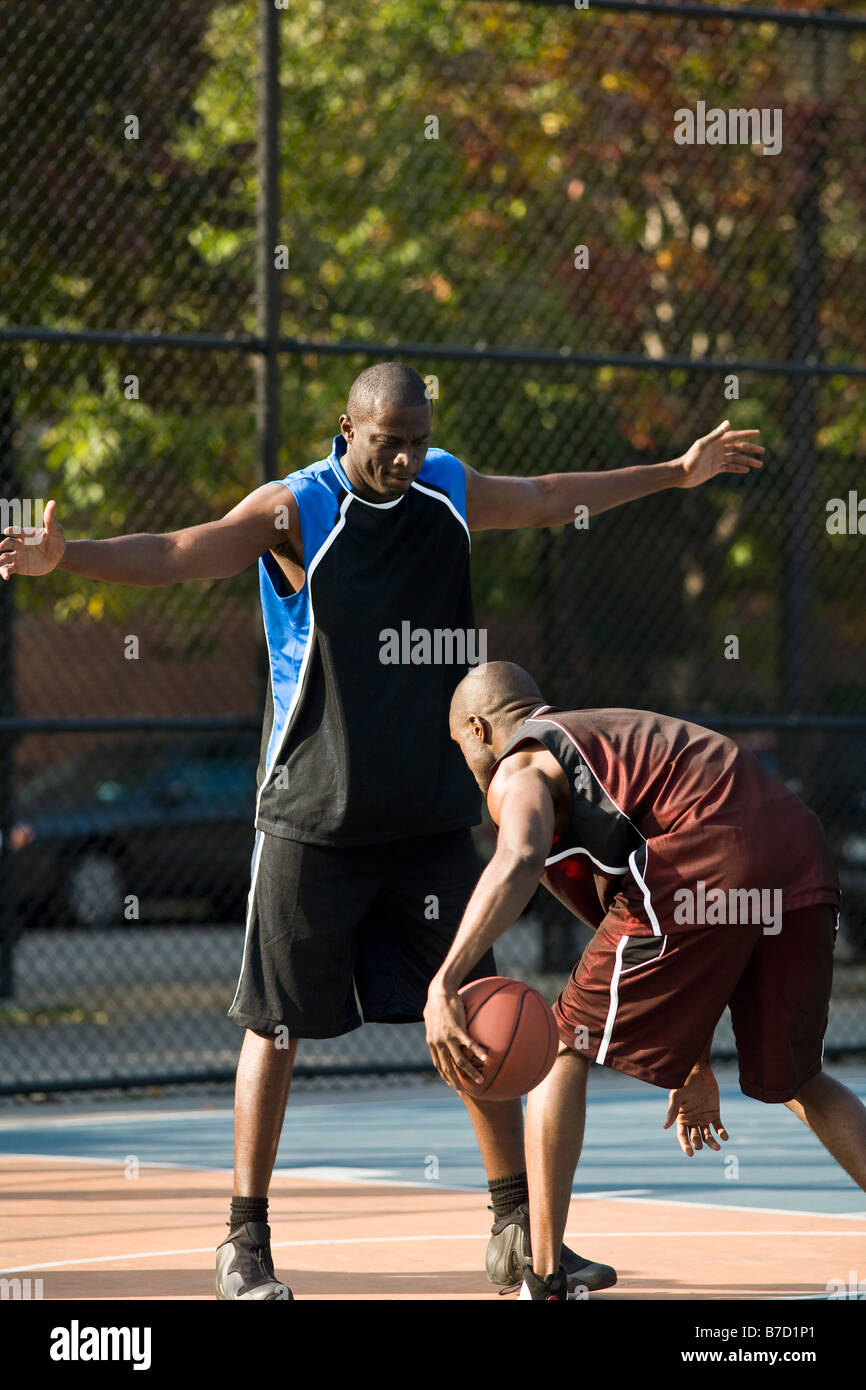 Guarding with arms hi-res stock photography and images - Alamy