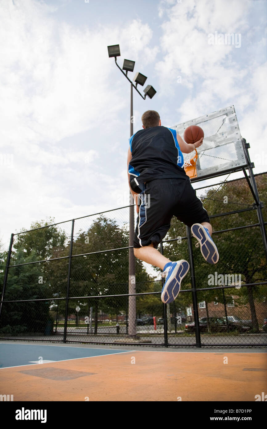 A basketball player making a lay up shot Stock Photo - Alamy