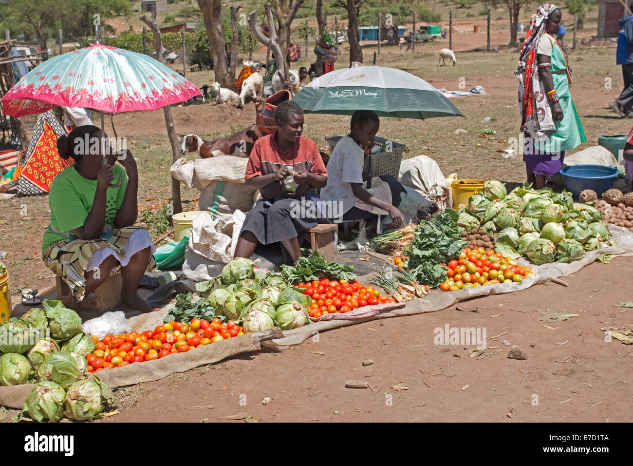 Selling vegetables at african market hi-res stock photography and ...