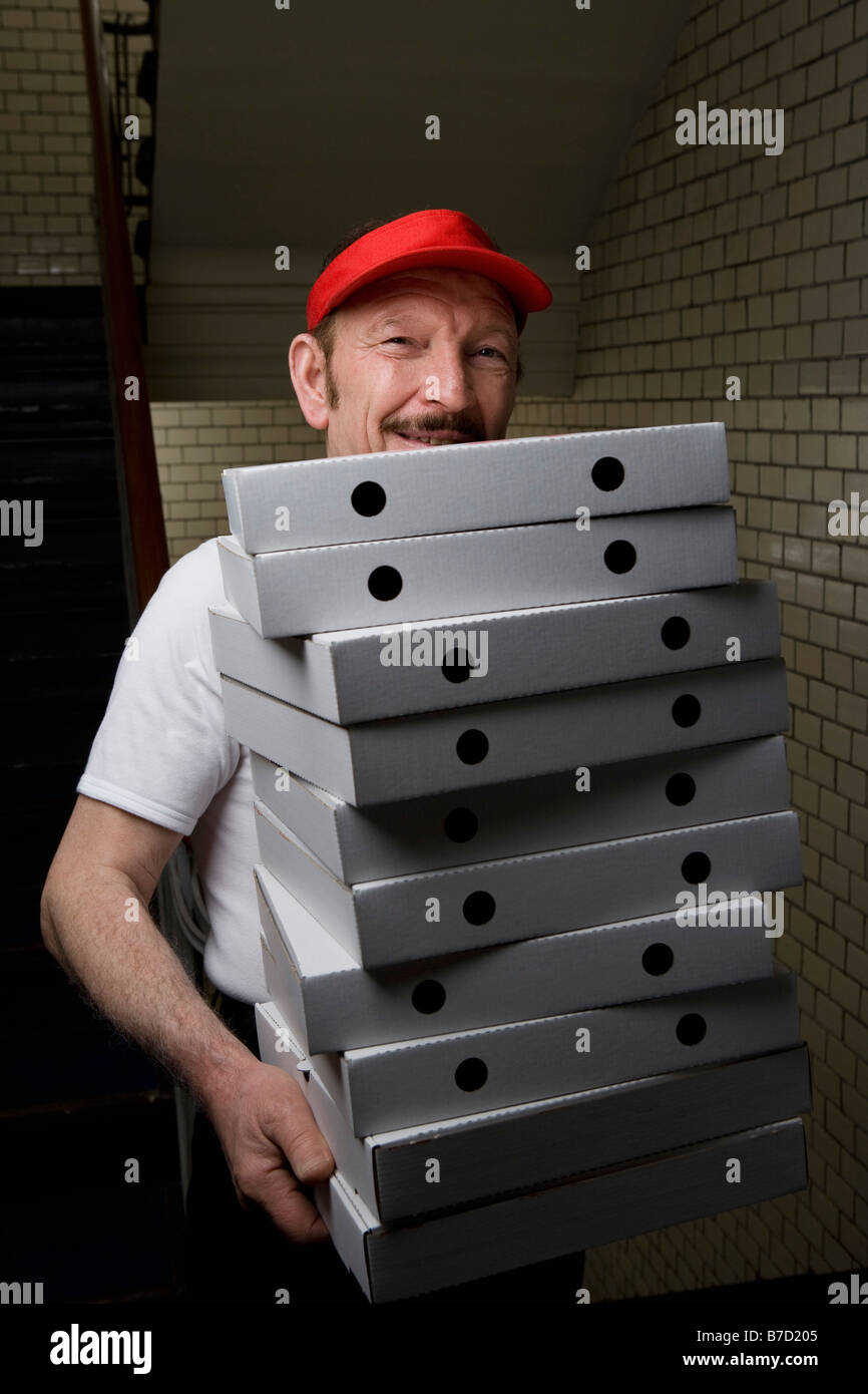 A pizza delivery man, portrait Stock Photo - Alamy