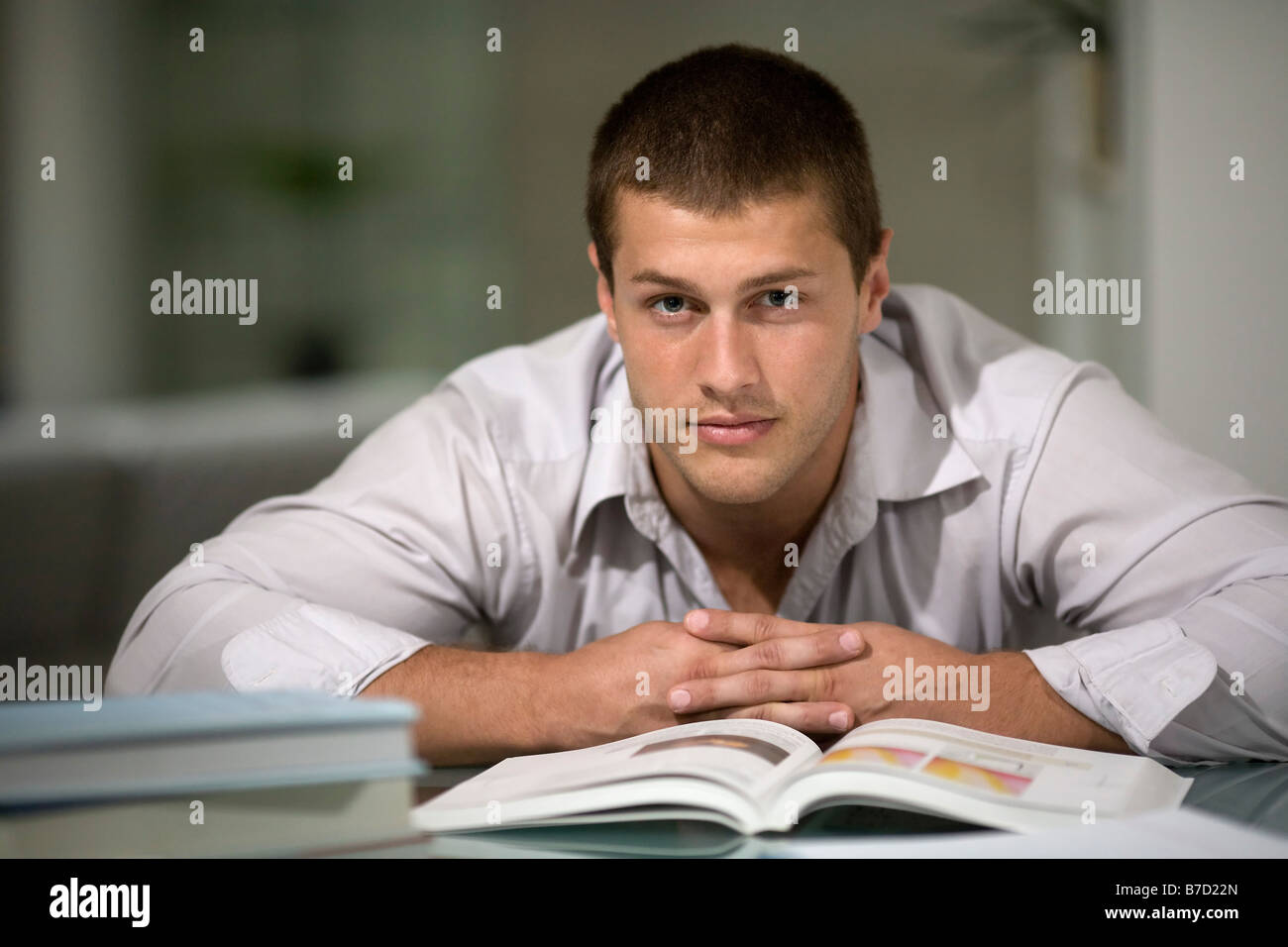 Man with open book hi-res stock photography and images - Alamy