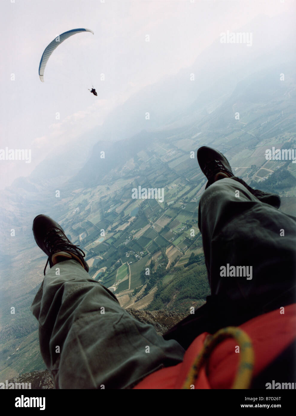 View of a man parasailing Stock Photo - Alamy