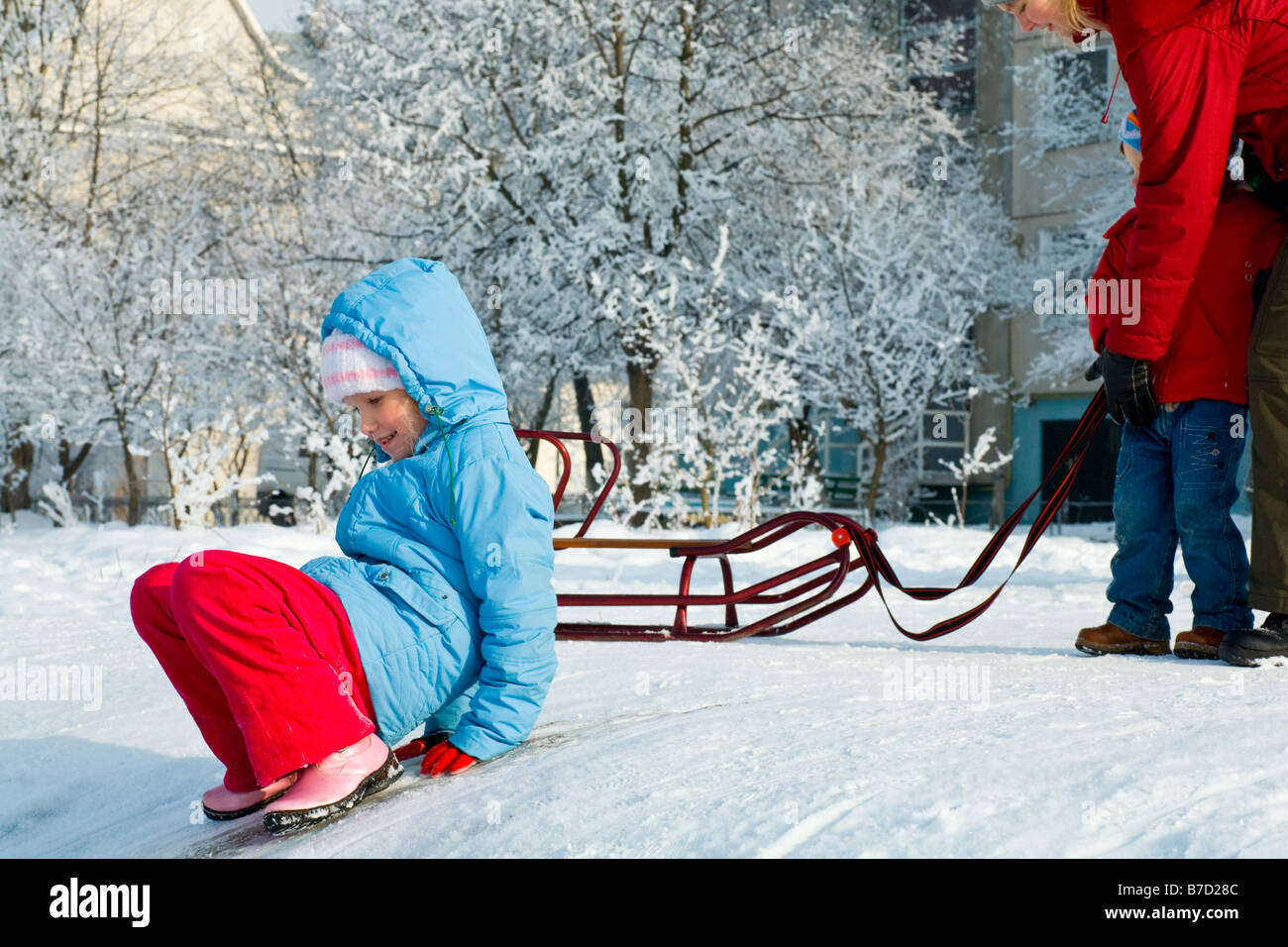 Woman small child in courtyard hi-res stock photography and images - Alamy
