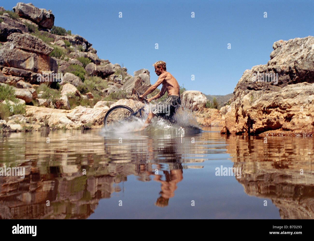 Cycling through water hi-res stock photography and images - Alamy