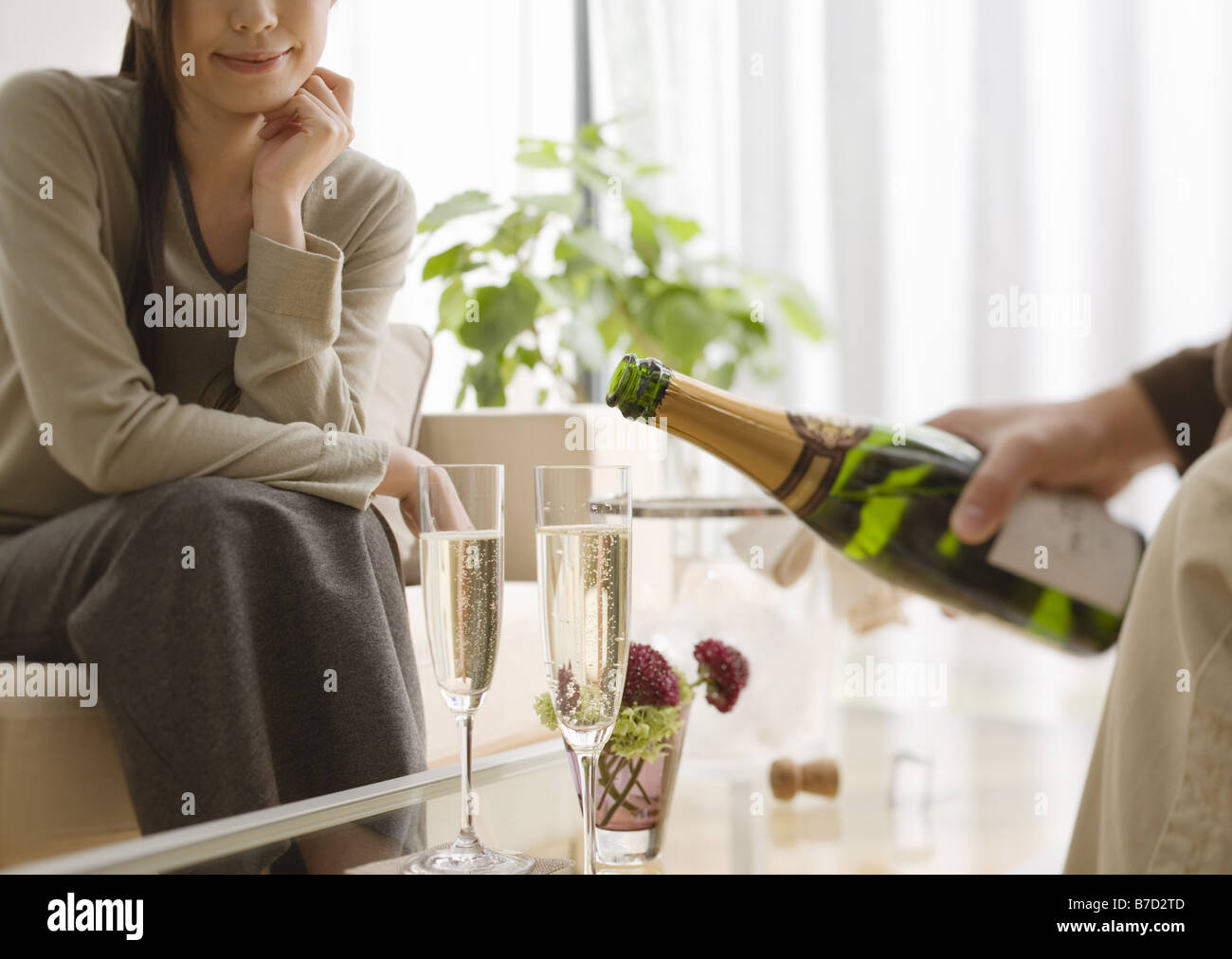 Couple drinking champagne Stock Photo - Alamy