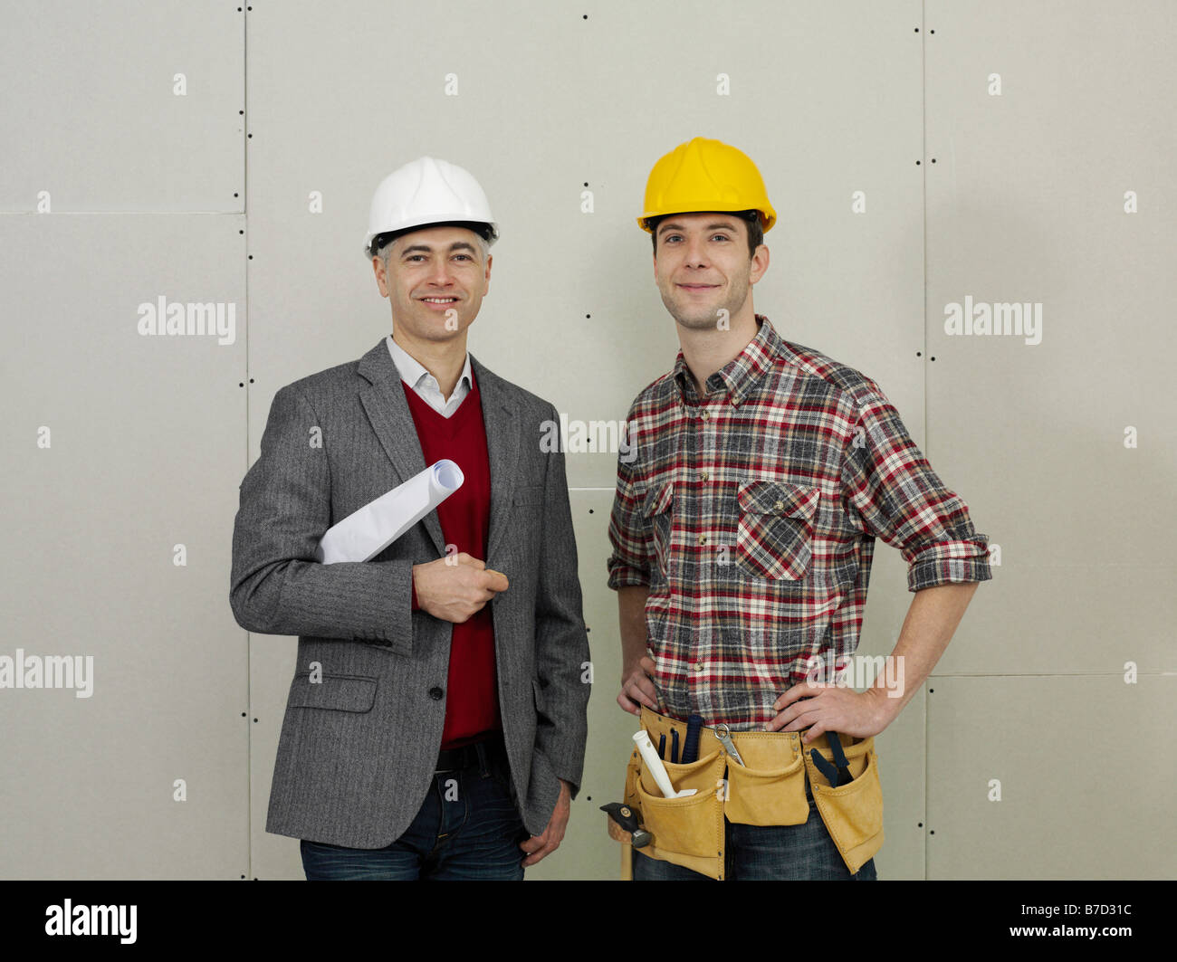 An architect and a construction worker, portrait Stock Photo - Alamy