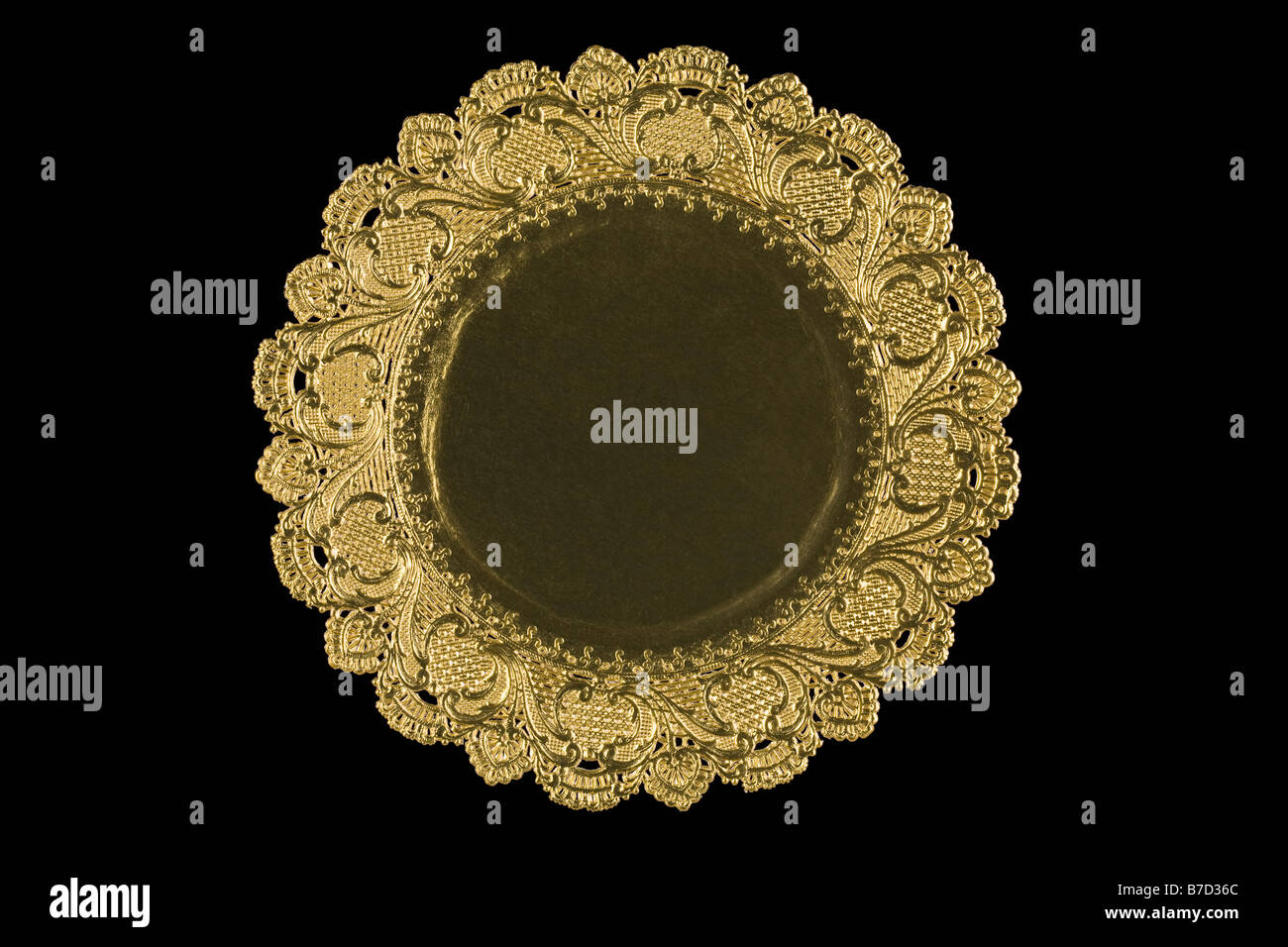 A gold ornamental plate Stock Photo - Alamy