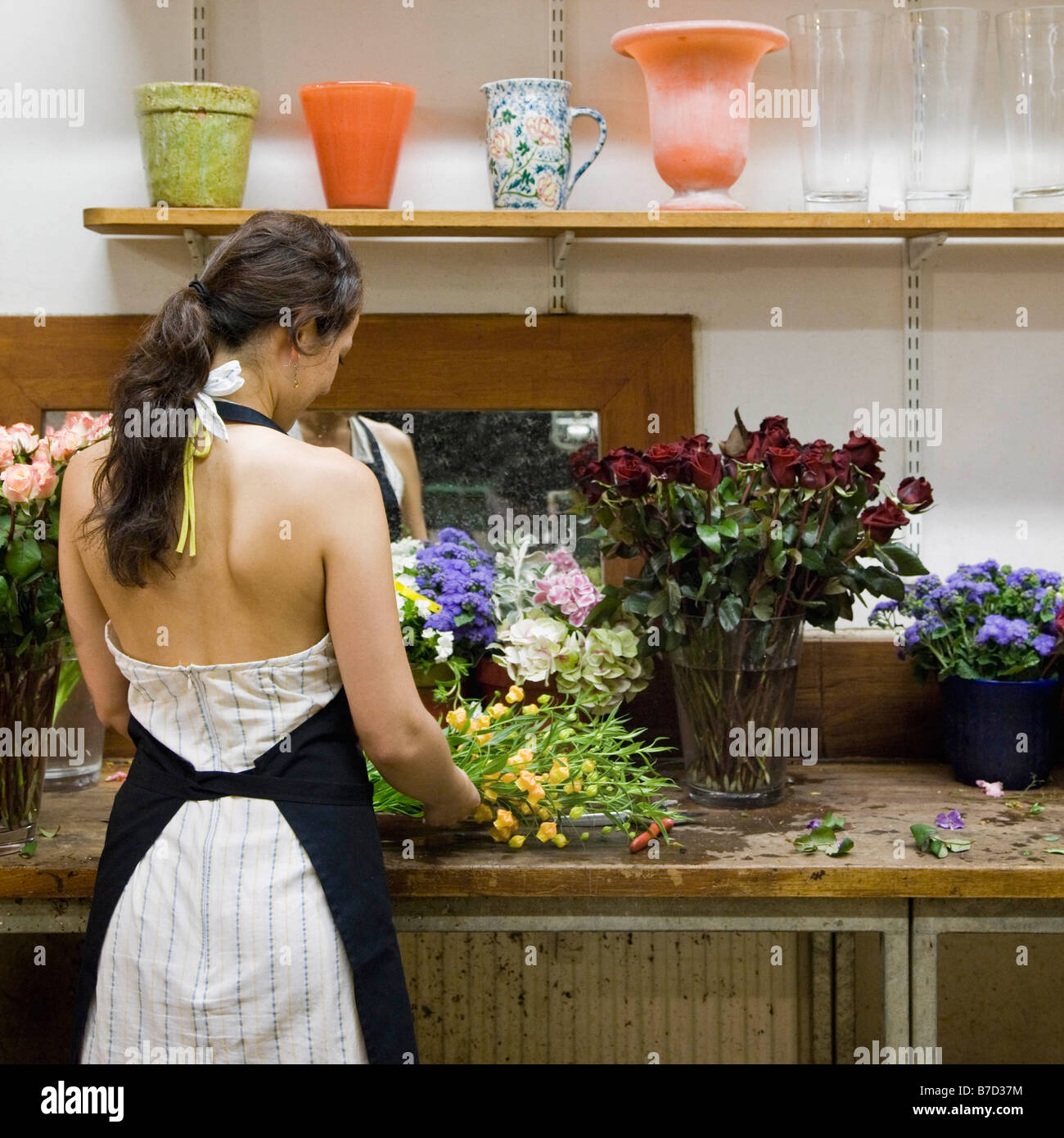 Female shopkeeper in shop hi-res stock photography and images - Alamy