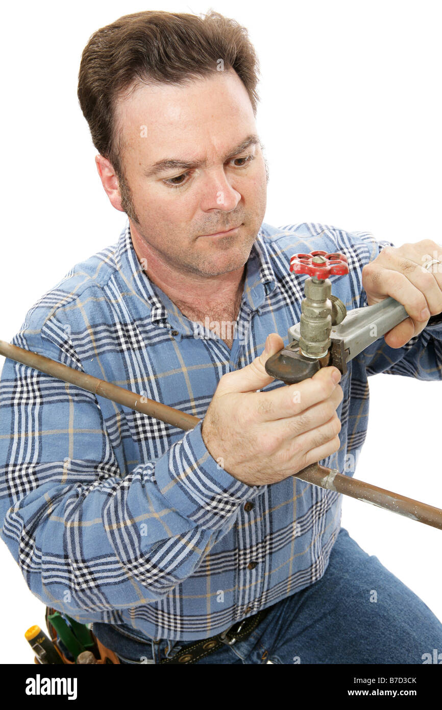 Mature plumber using pipe hi-res stock photography and images - Alamy