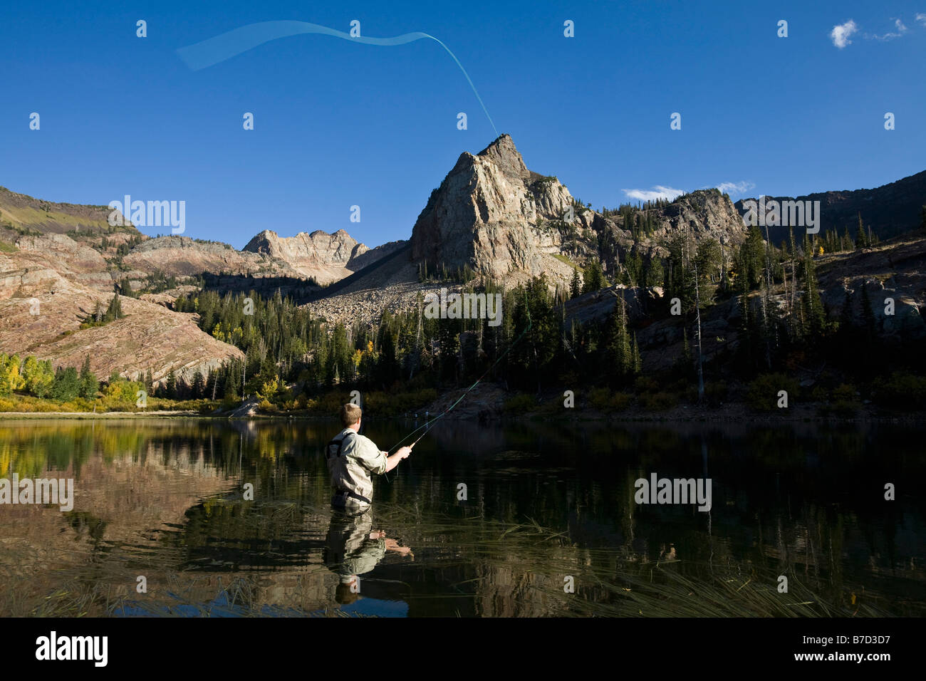 Man in overalls fishing hi-res stock photography and images - Alamy