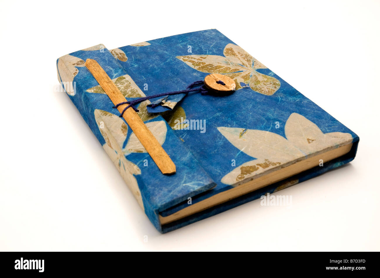 Small blue Diary decorated with leaves on a white background Stock ...