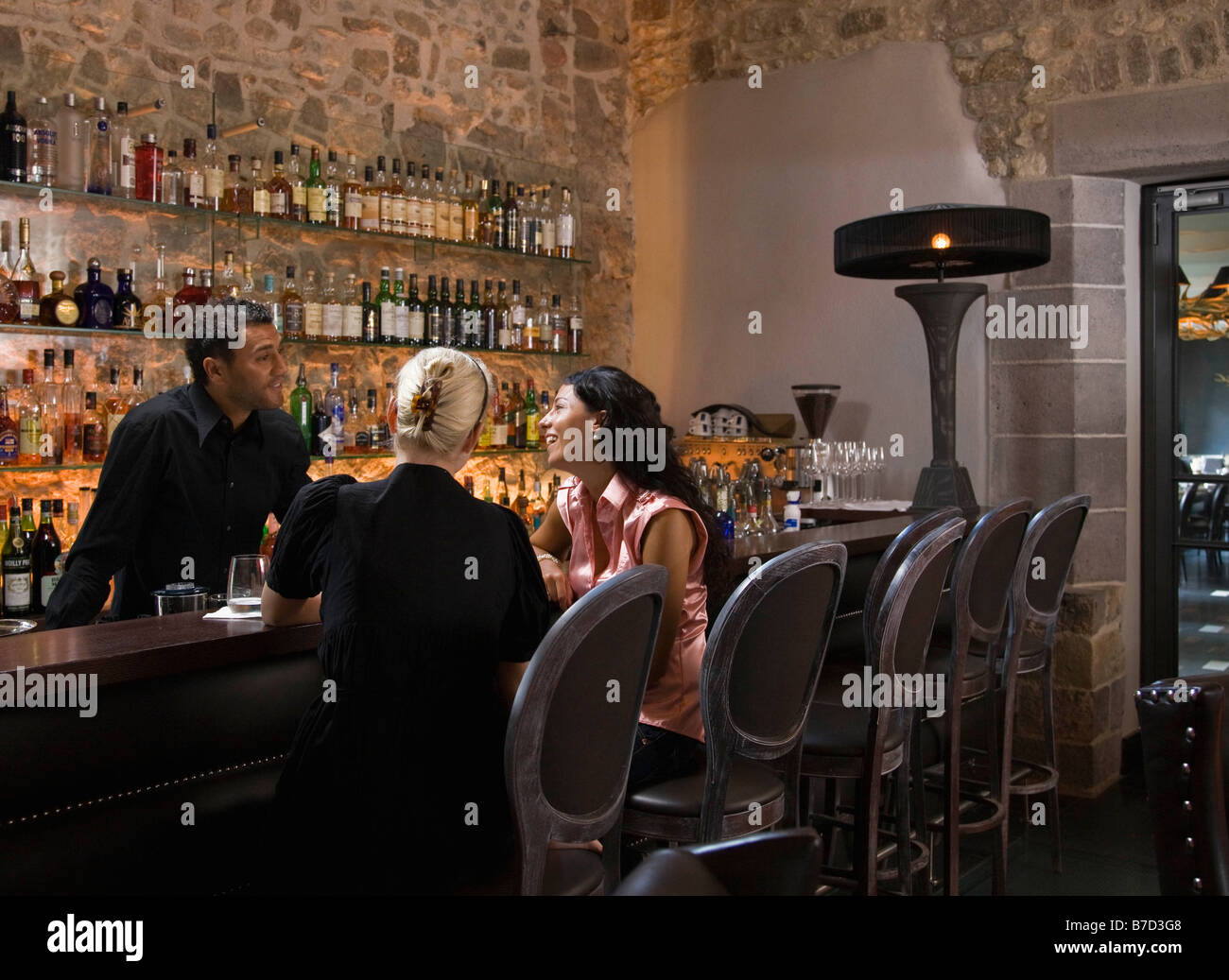 Conversation bartender hi-res stock photography and images - Alamy