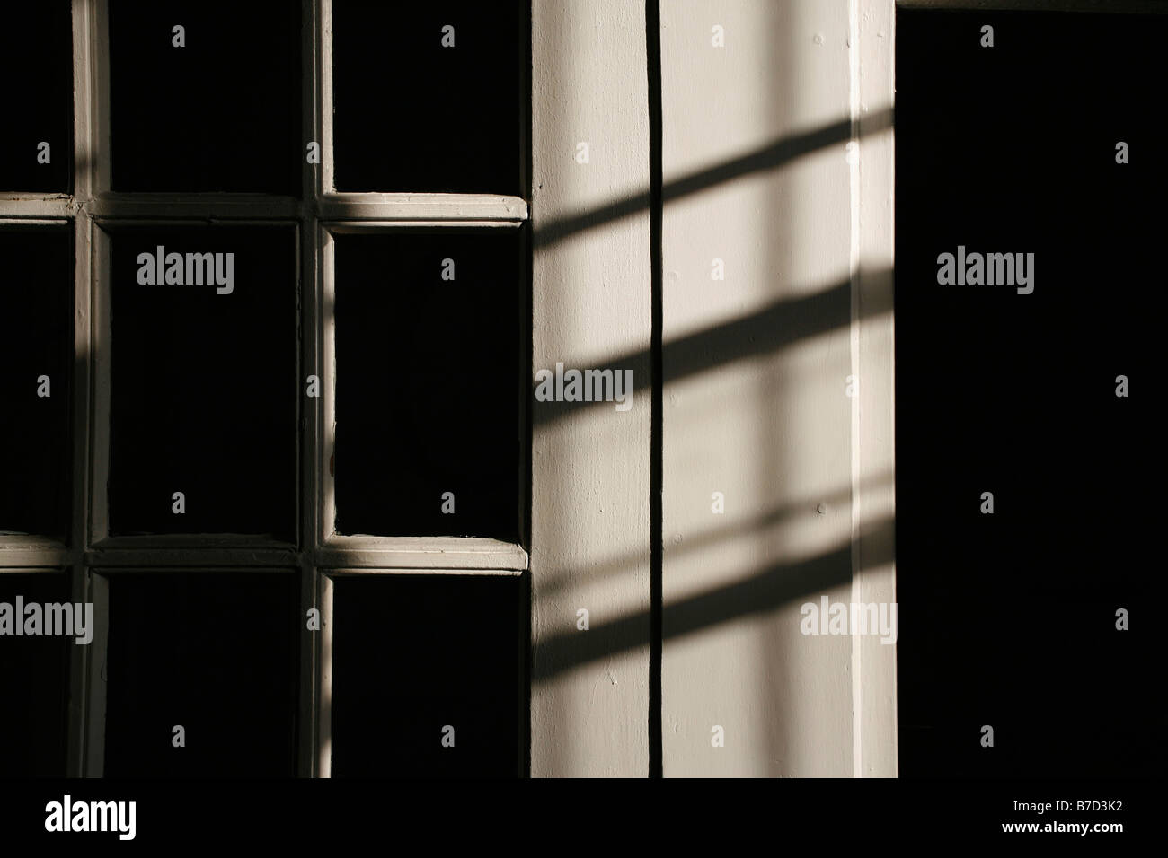 The shadow of a window frame Stock Photo - Alamy