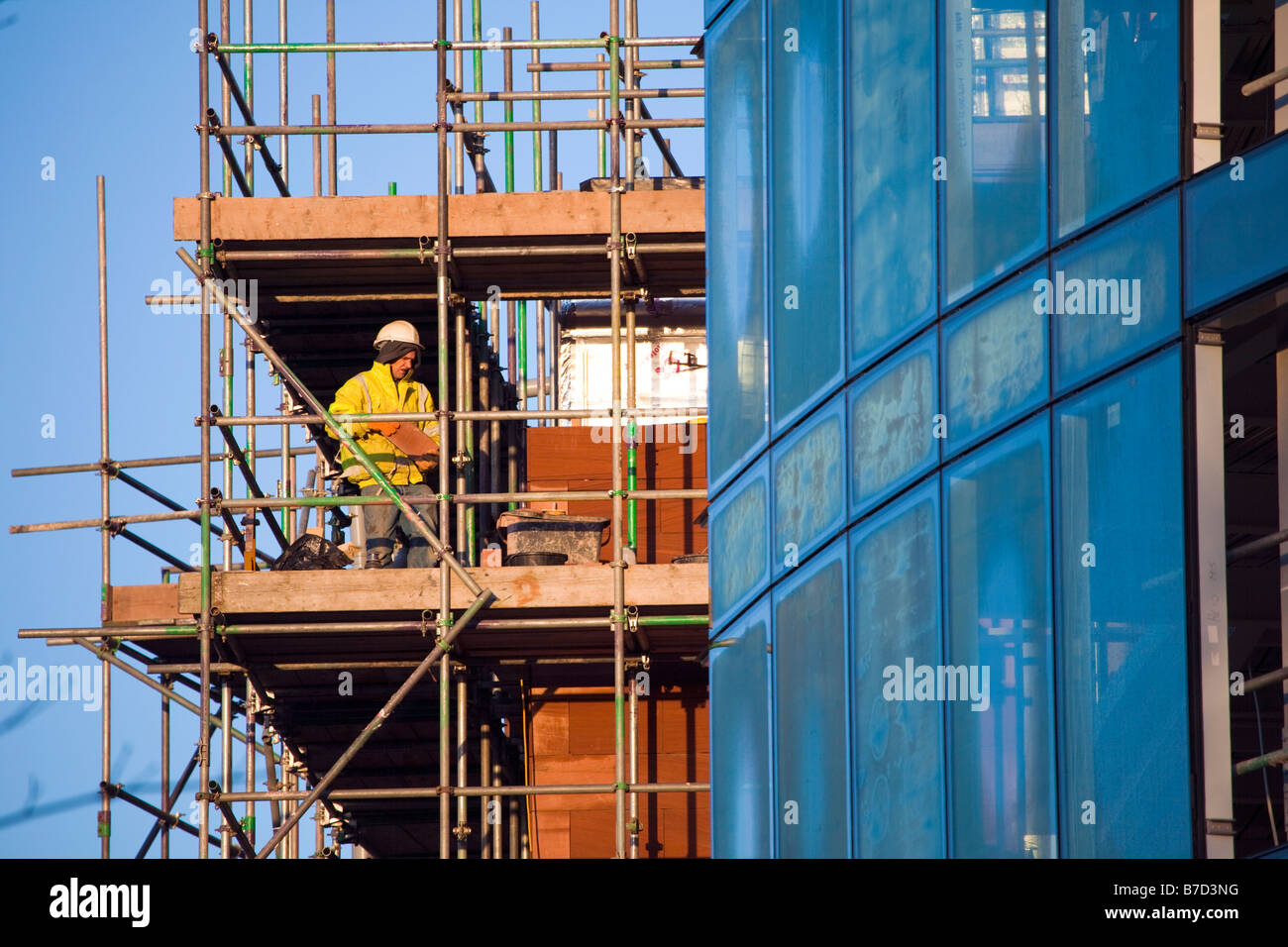 construction worker on hq building chester Stock Photo - Alamy