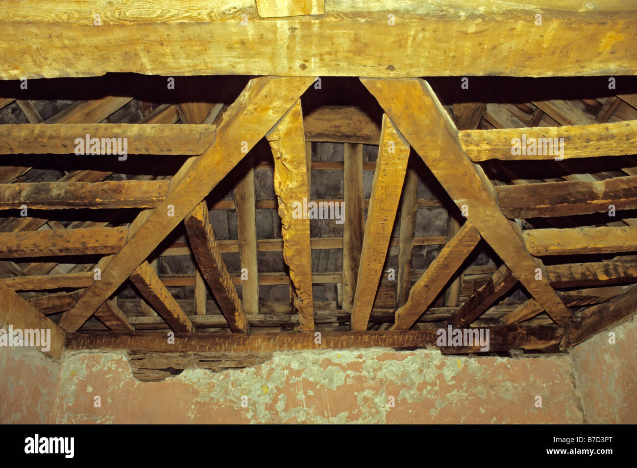 Underside of ceiling beams in old house with mansard roof - (before ...