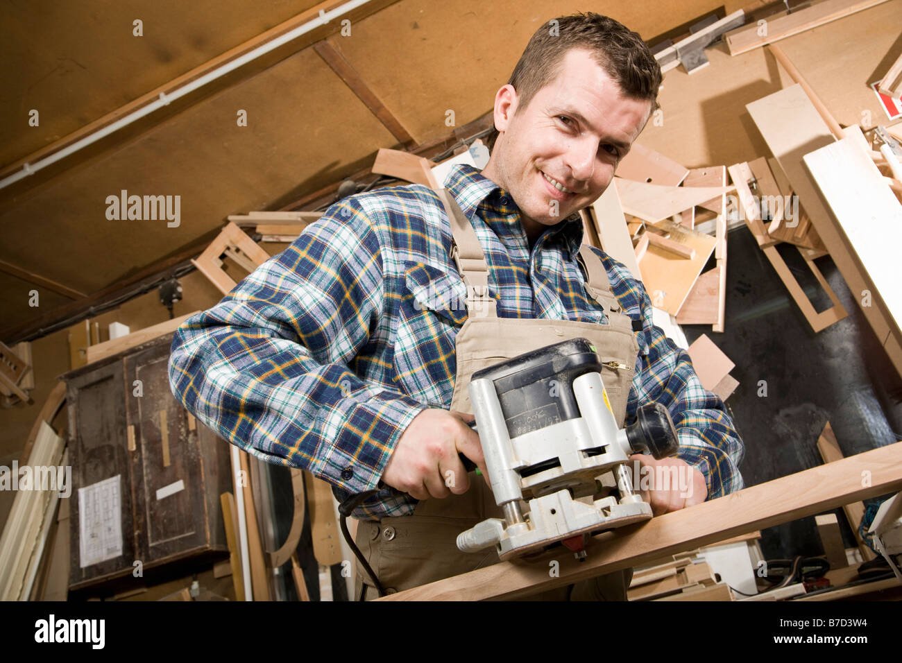 Man sanding wood using machine hi-res stock photography and images - Alamy