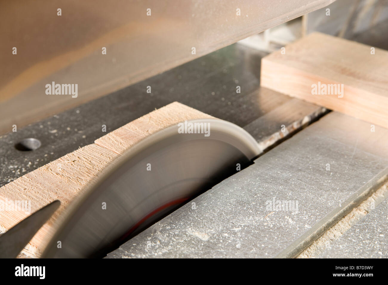 Detail of a circular saw cutting wood Stock Photo - Alamy