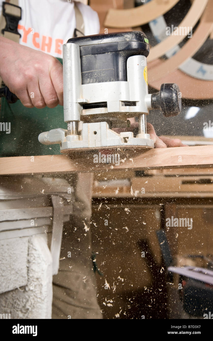 Detail of a carpenter using a sanding machine Stock Photo - Alamy