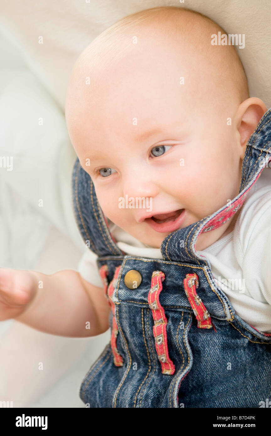 A baby relaxed and smiling Stock Photo - Alamy