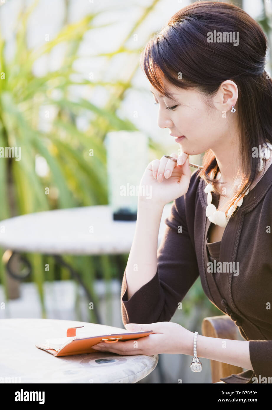 Upper view woman writing hi-res stock photography and images - Alamy