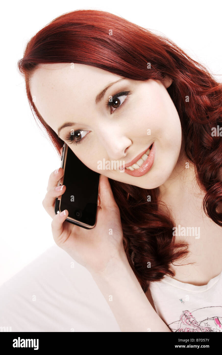 Young woman using an Apple iPhone Stock Photo - Alamy