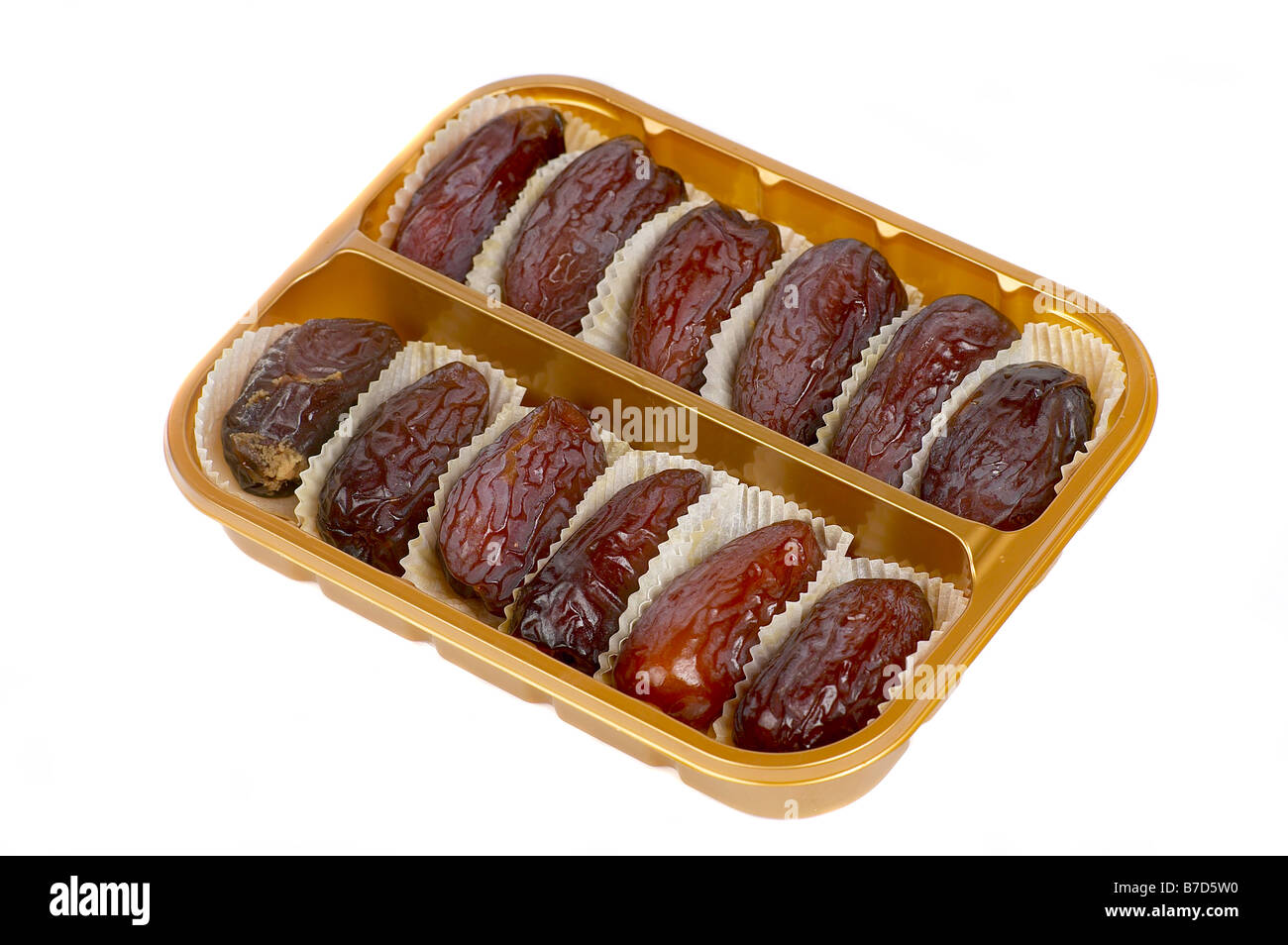 plastic tray of dates Stock Photo - Alamy