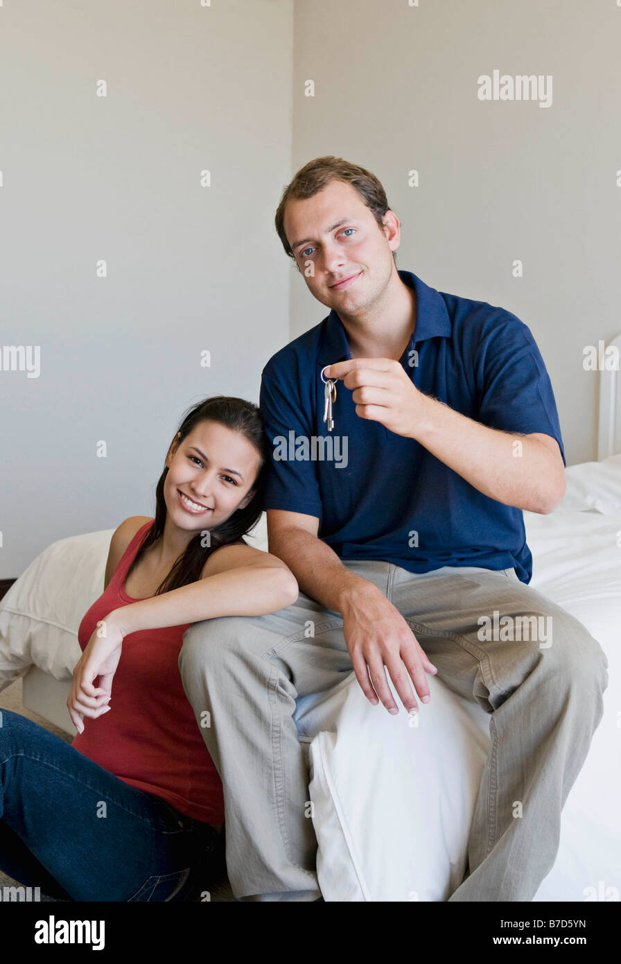 A couple in their bedroom Stock Photo - Alamy