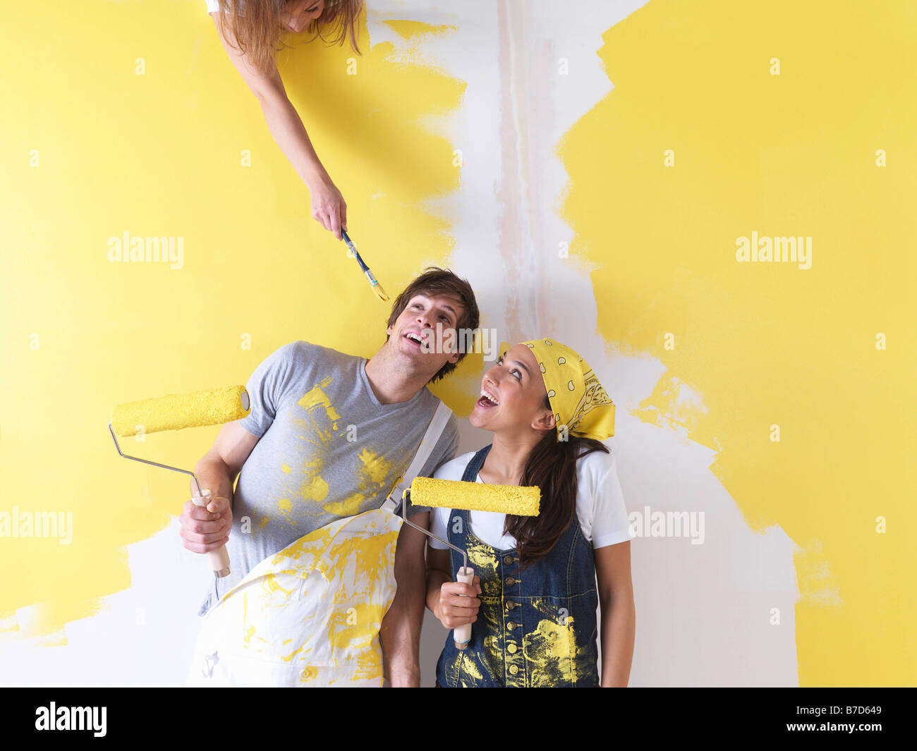 Couple messing around with paint Stock Photo - Alamy