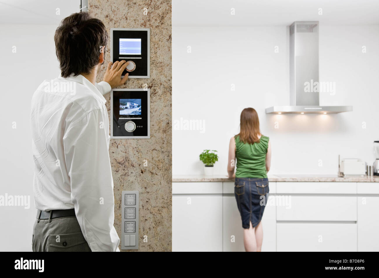 Man tuning the radio Stock Photo - Alamy