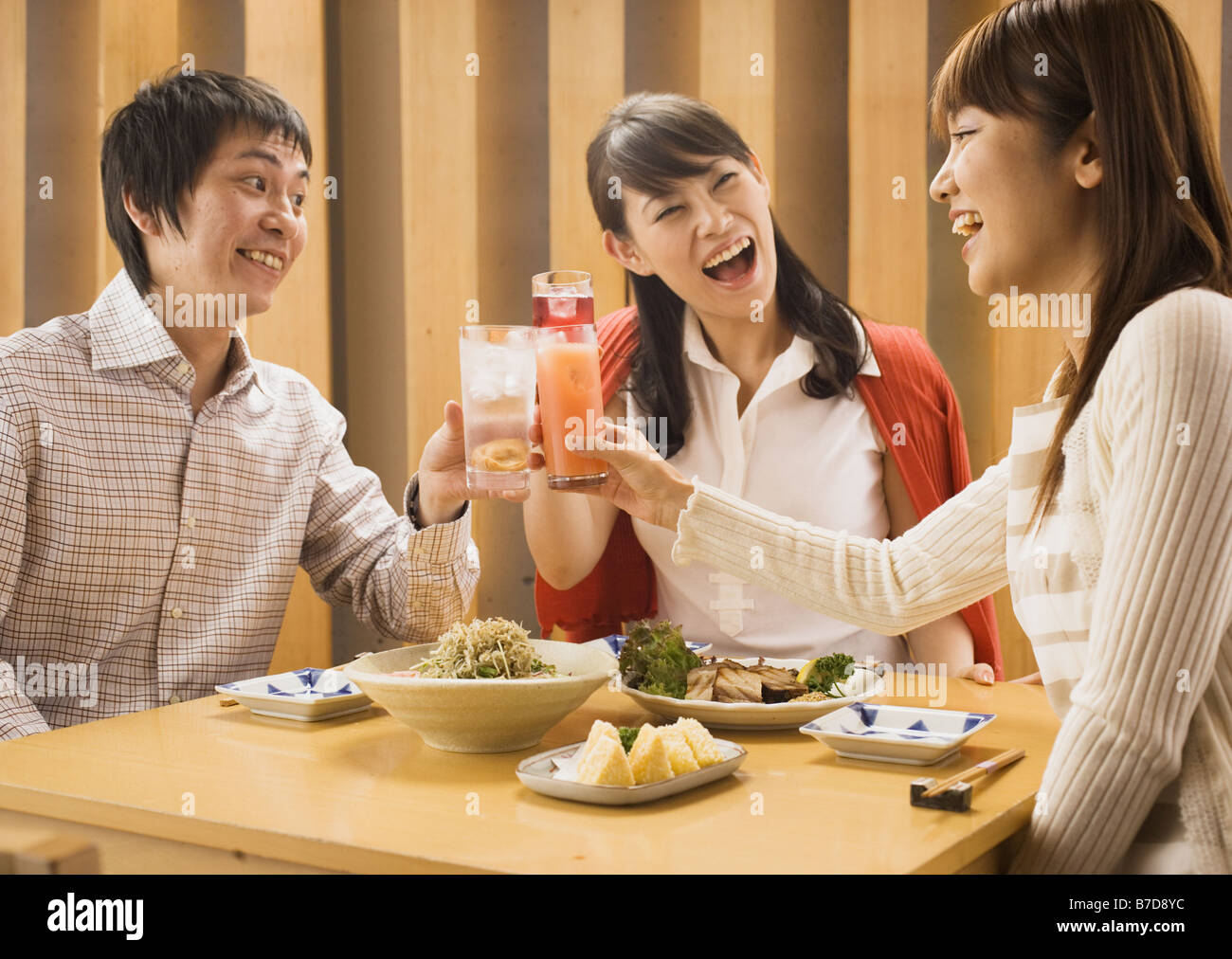 Group of Young People Enjoying Drinks Stock Photo - Alamy