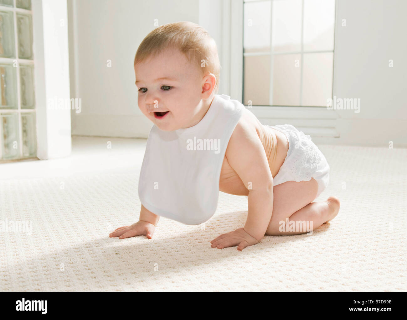 A baby crawling Stock Photo - Alamy