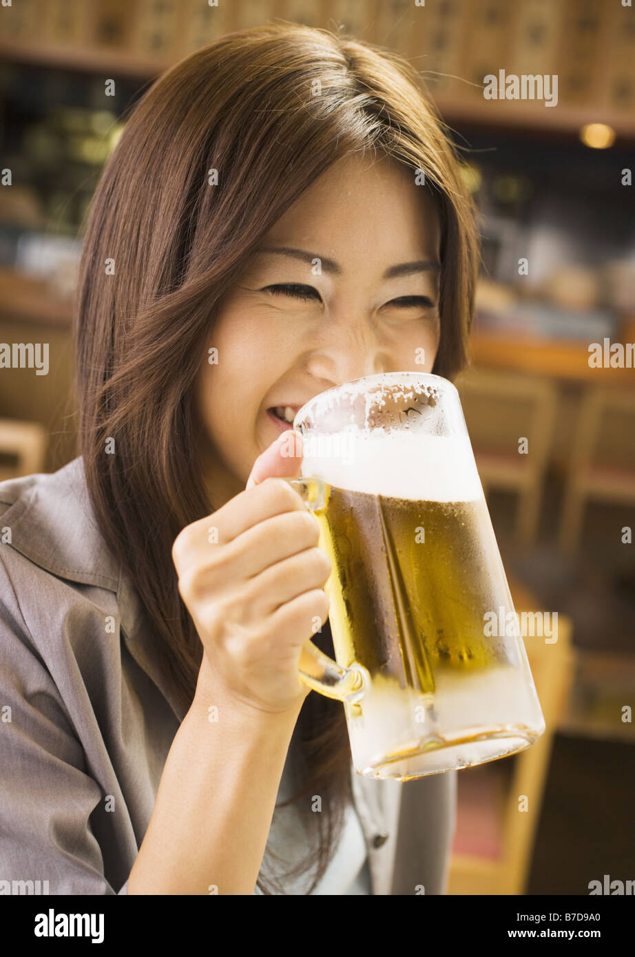 Woman Drinking Beer Stock Photo - Alamy