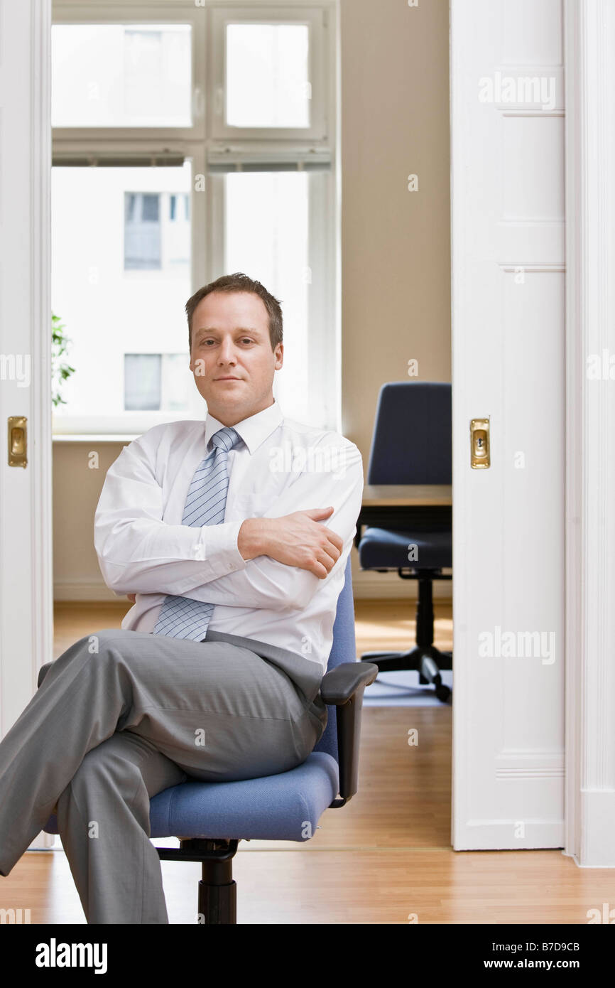 Portrait of a man in his office Stock Photo - Alamy