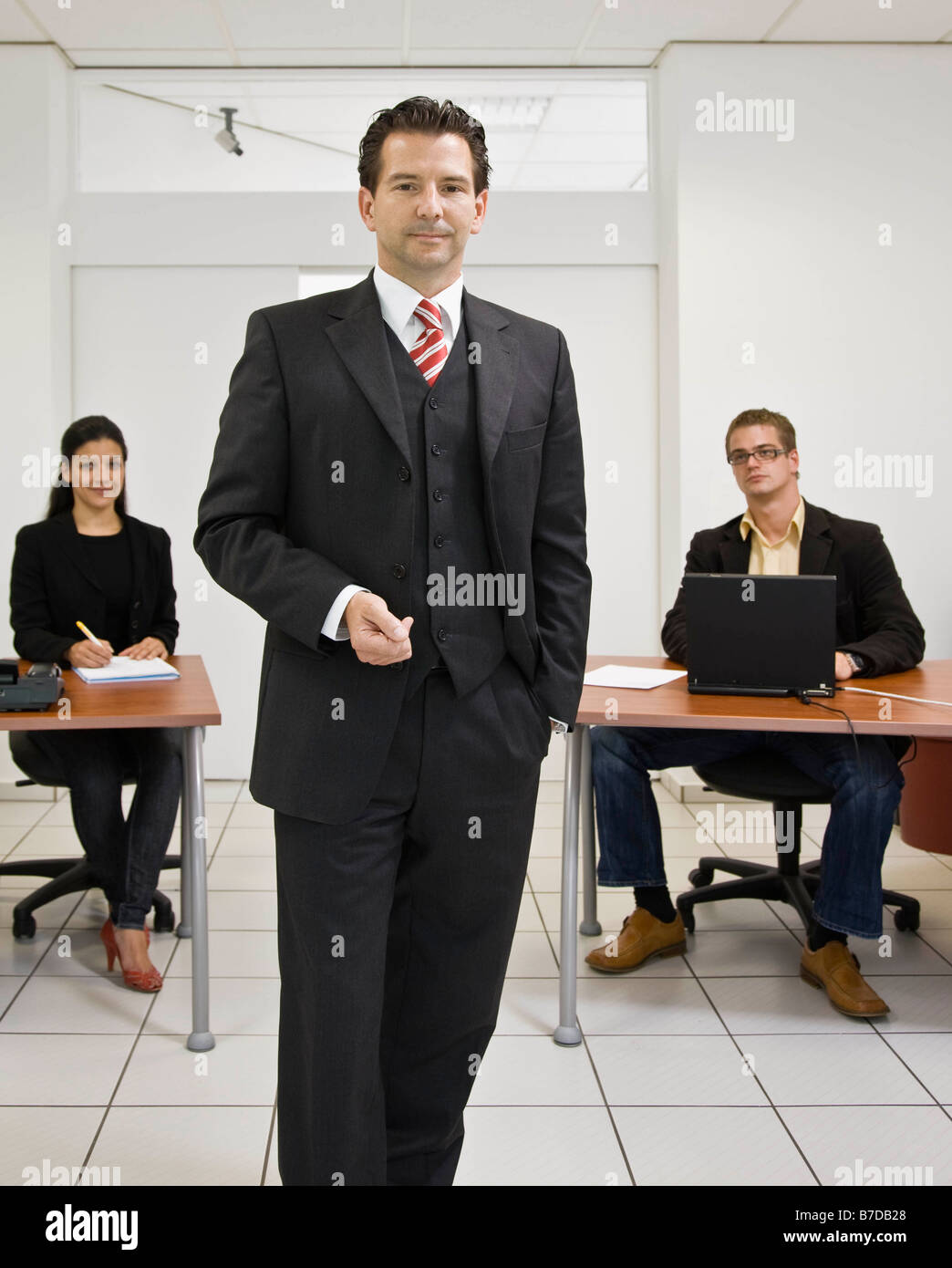 Portrait of boss with co-workers Stock Photo - Alamy