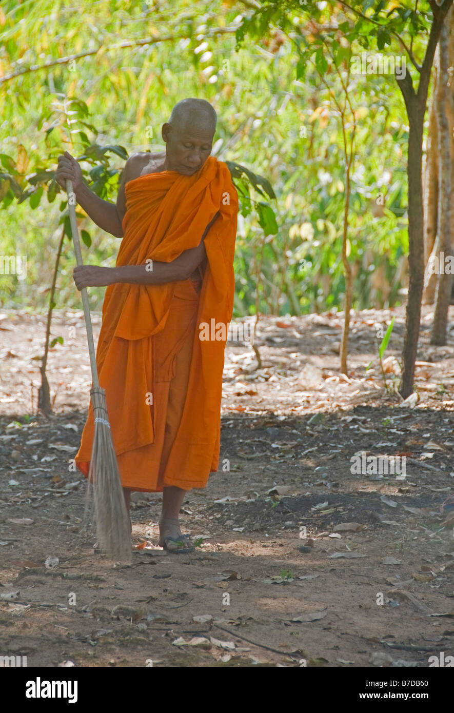 monk sweeping his temple grounds in Sangkhlaburi Thailand Stock Photo ...